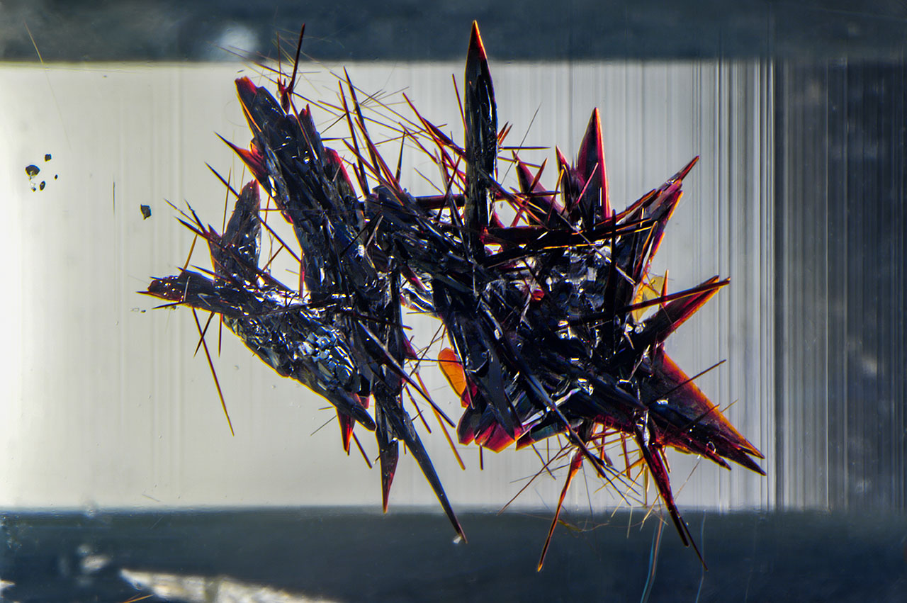 Quarterly Crystal: Columbite(?) in Beryl